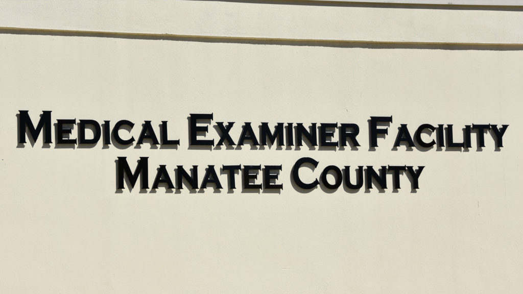 slider-sign - District 12 Medical Examiner Office